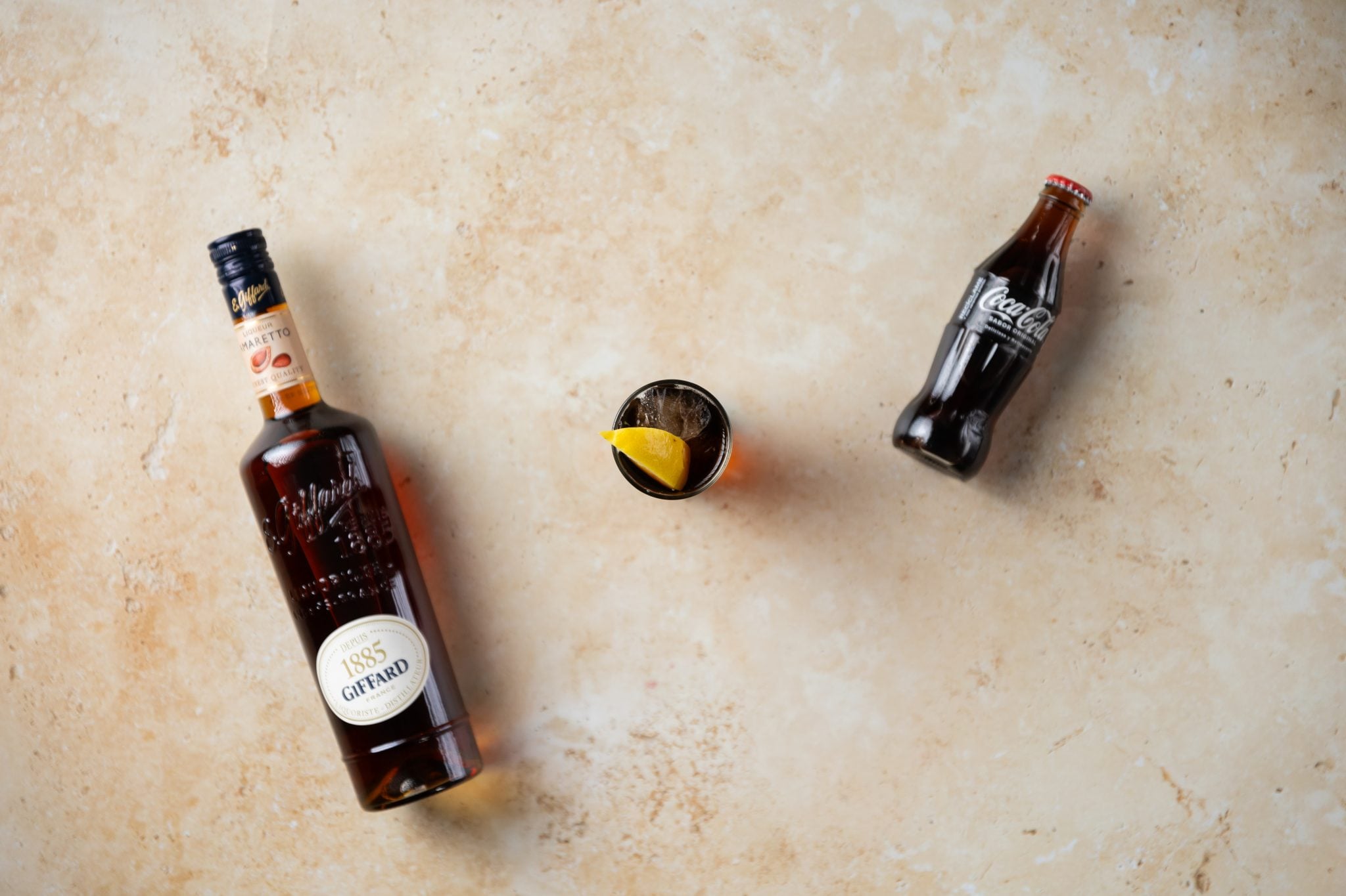 Amaretto and Coke Cocktail Recipe by DrinksWorld